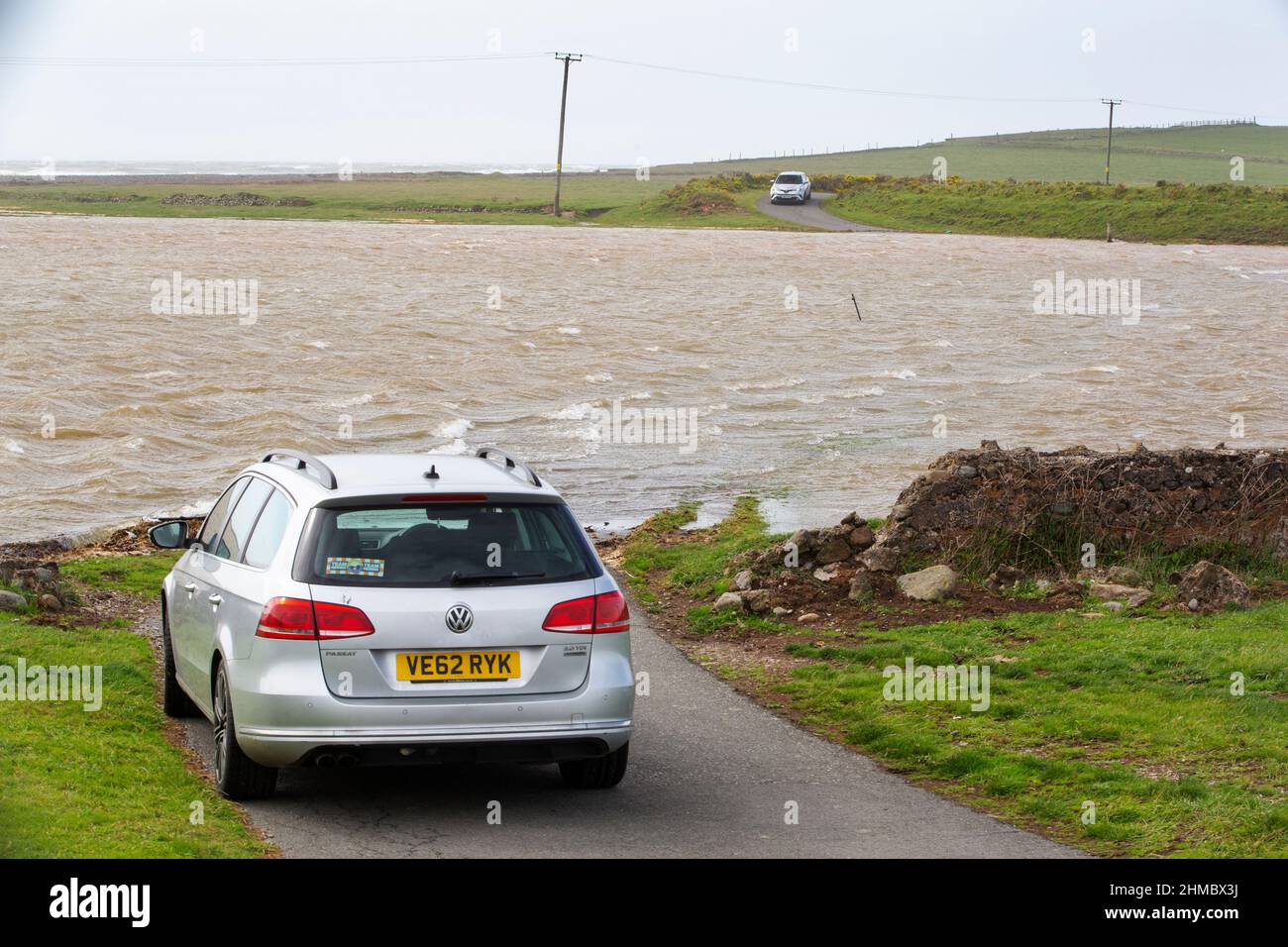 Road cut off by flooding Stock Photo - Alamy
