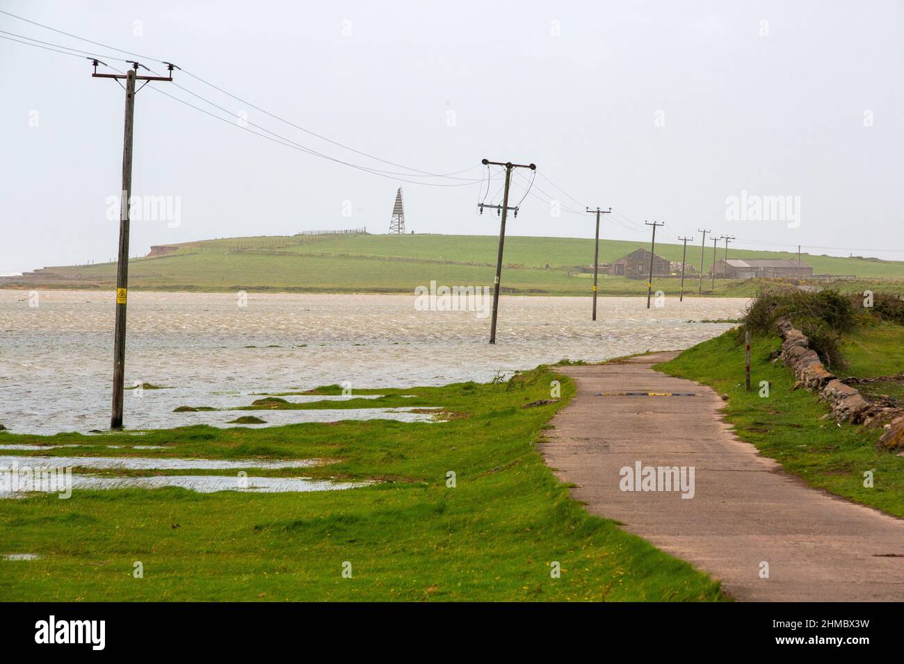 Road cut off by flooding Stock Photo - Alamy