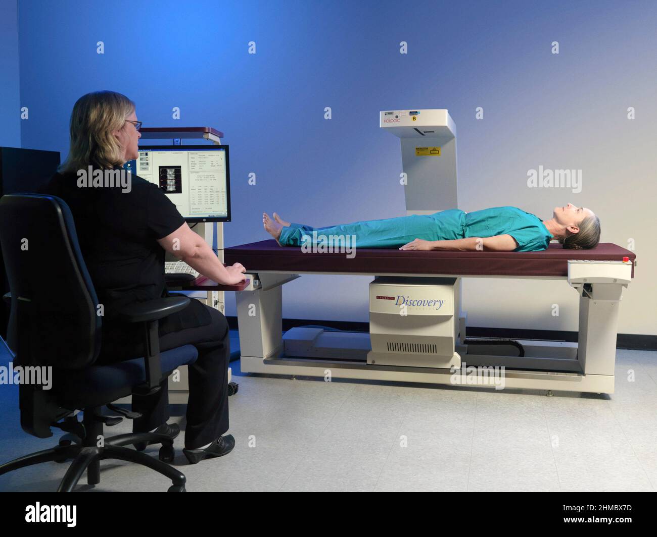 Bone density scan being performed on a test subject Stock Photo - Alamy