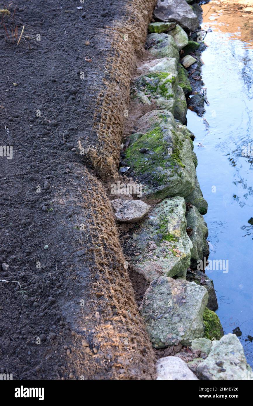 Reconstruction of eroded bank Stock Photo - Alamy