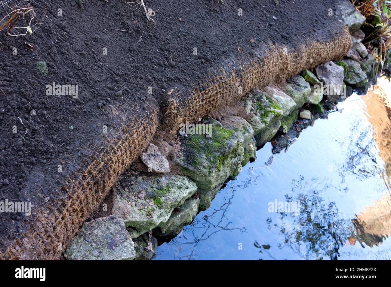 Reconstruction of eroded bank Stock Photo - Alamy
