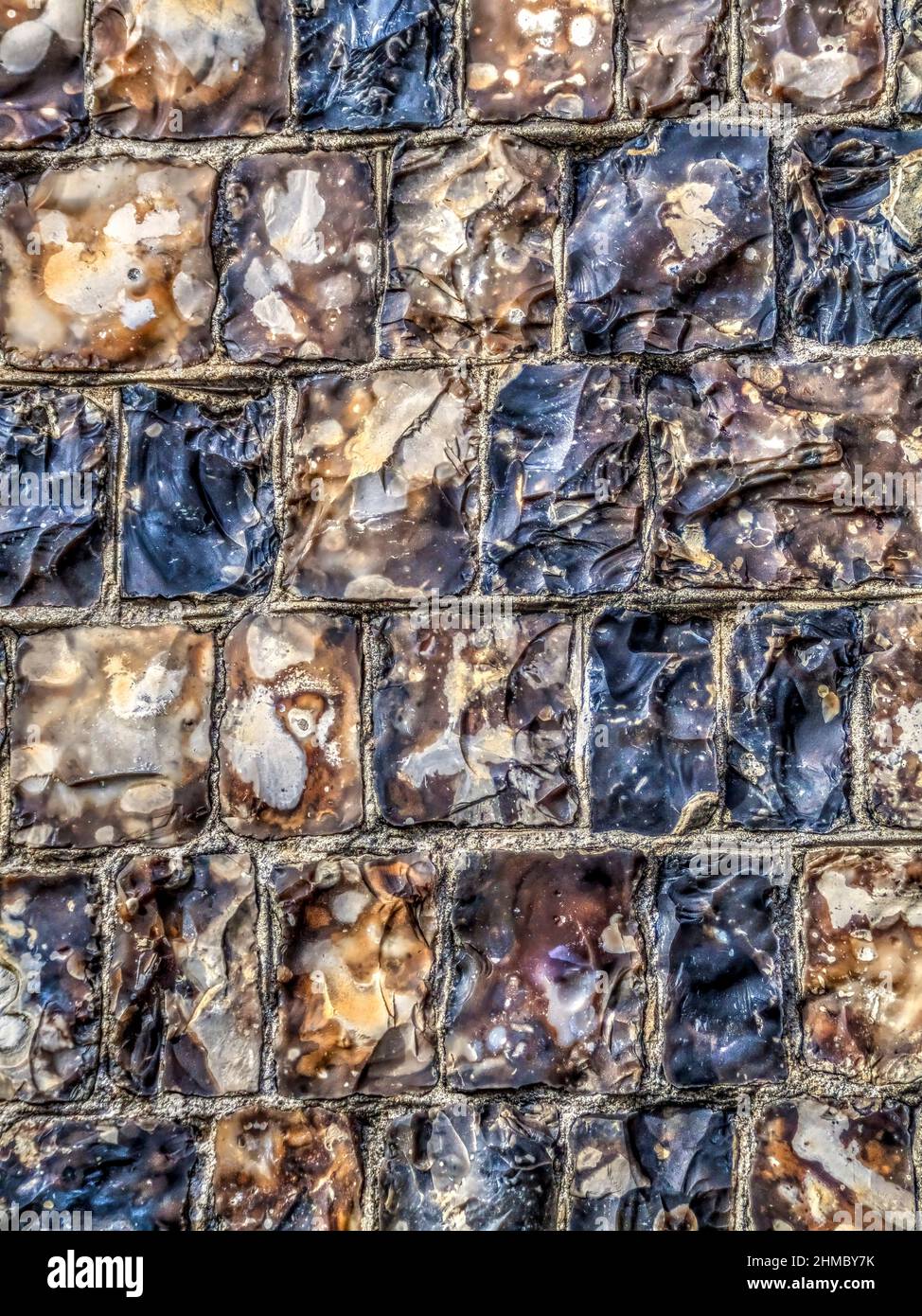 Knapped flint courses in a church wall Stock Photo - Alamy