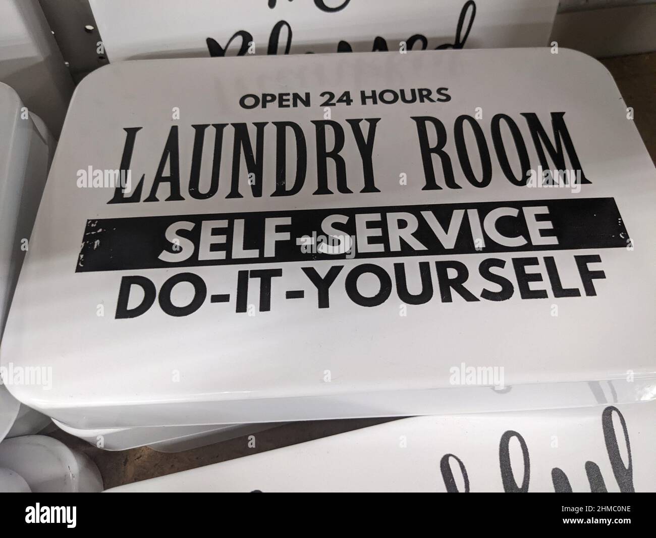 Laundry Room Self Service Signage Stock Photo - Alamy