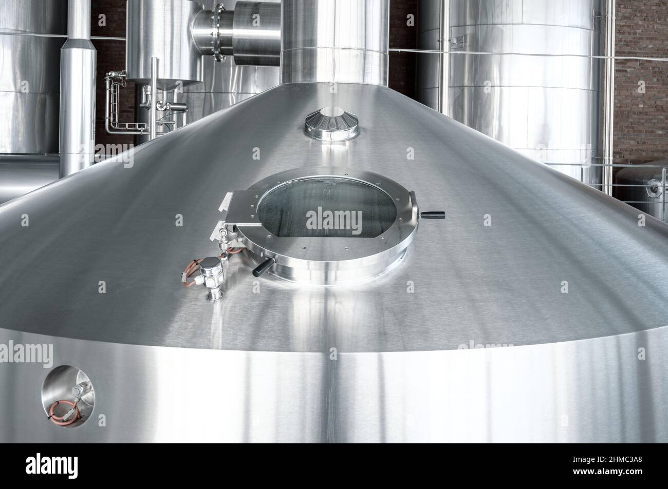 Large yeast fermentation tanks. Industrial production of beer Stock Photo - Alamy