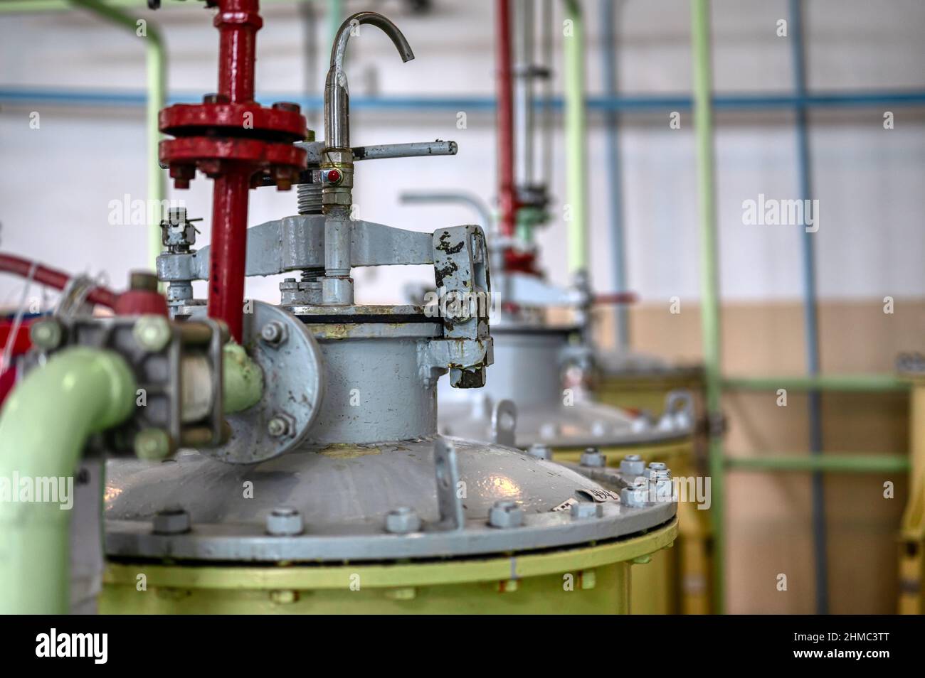 Modern sand and coal filtration columns with red pipelines Stock Photo ...
