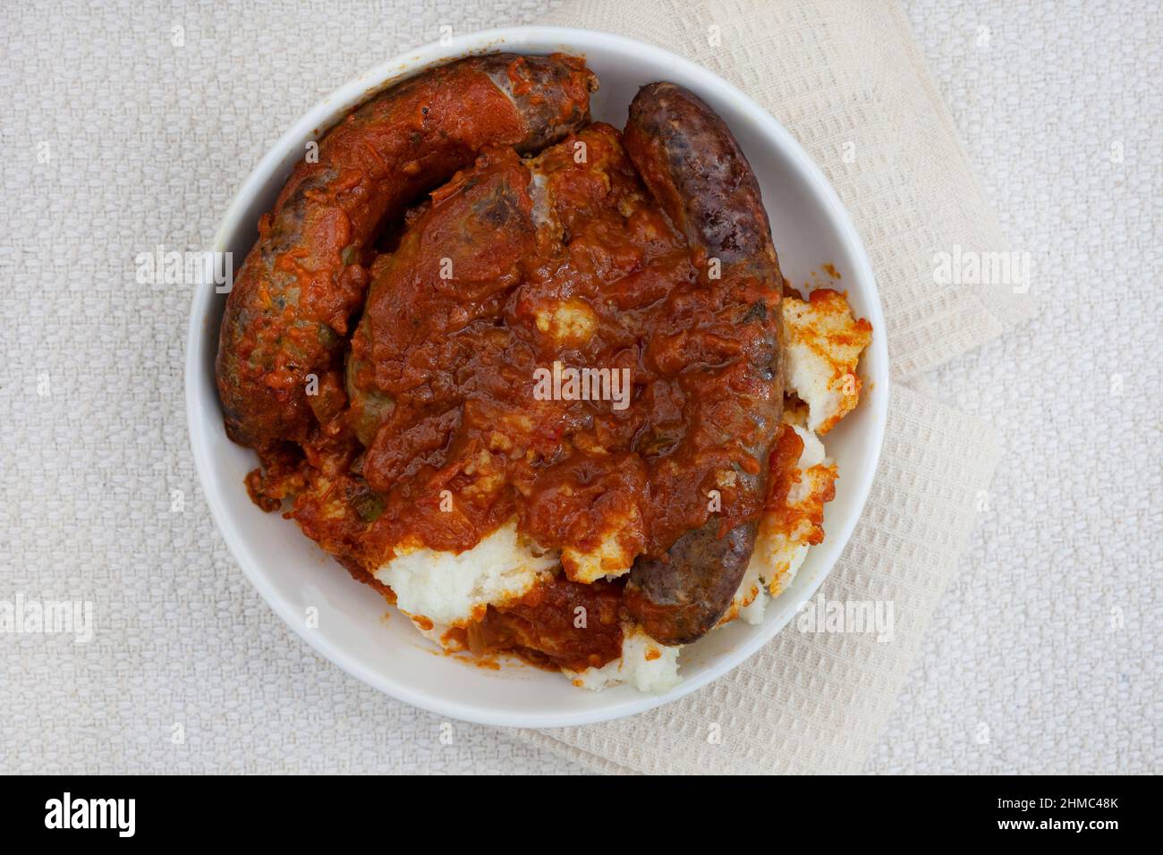 Traditional south African pap and Wors, maize meal with sausage and ...