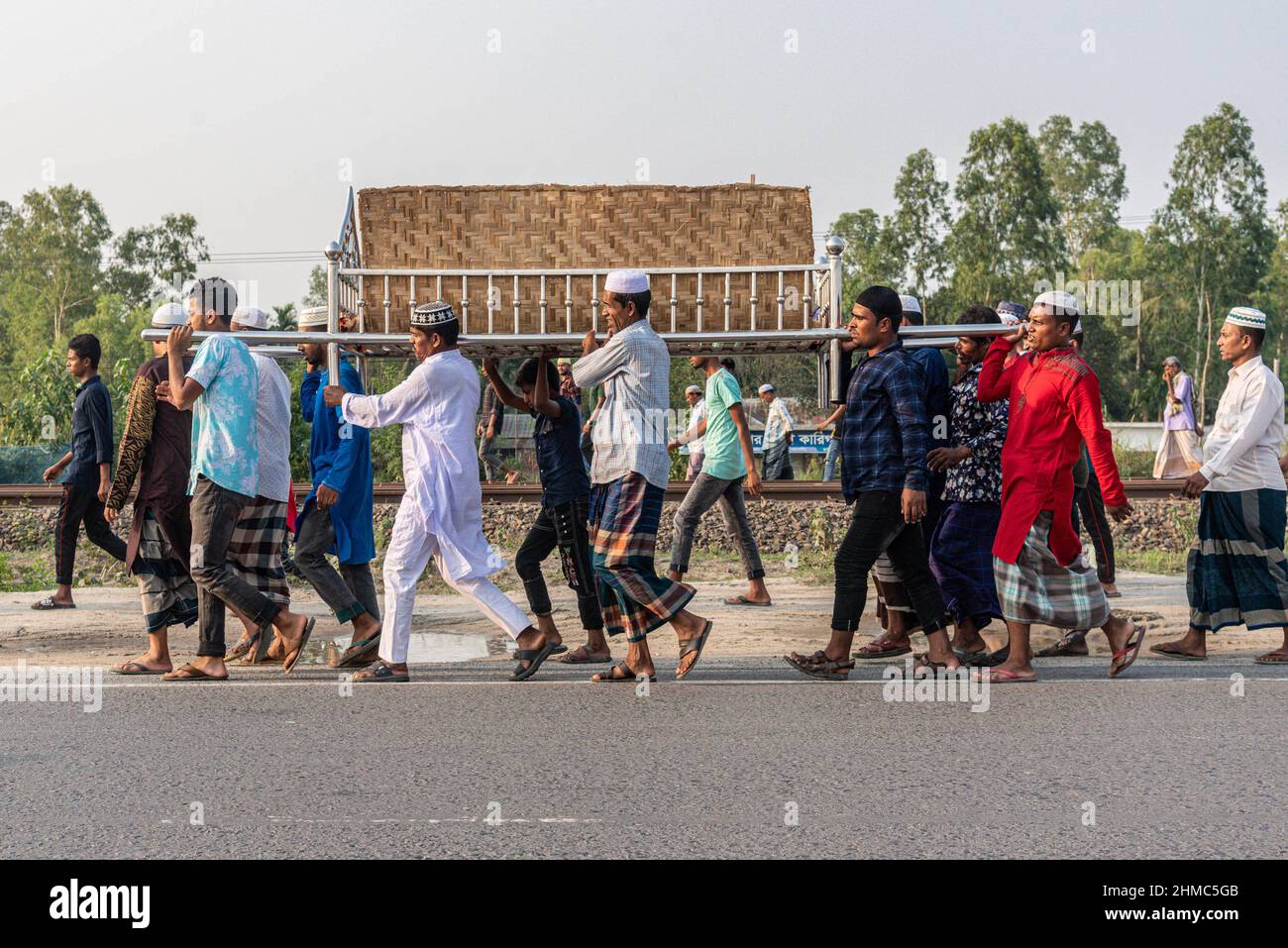 A group of men carry a corpse over the road to a Cemetery. Cemeteries ...