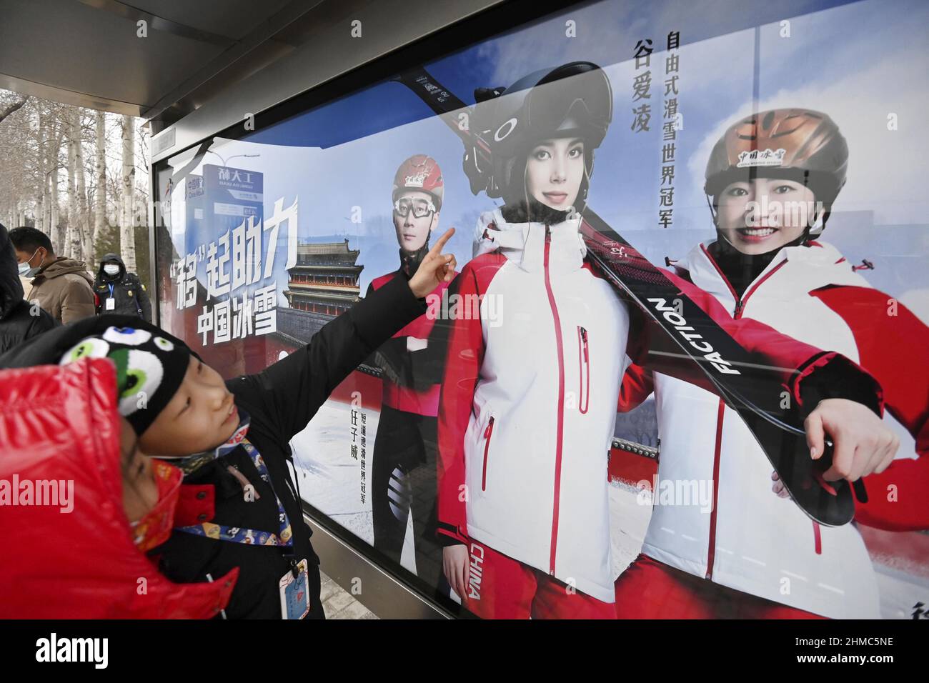 A poster of U.S.-born Chinese skier Eileen Gu (2nd from R), one of the ...