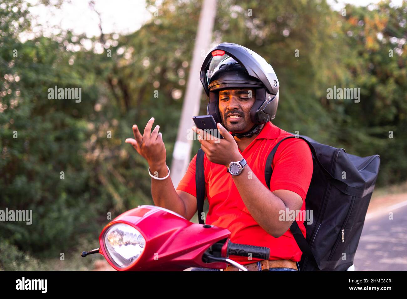 Indian delivery boy on bike hi-res stock photography and images - Alamy