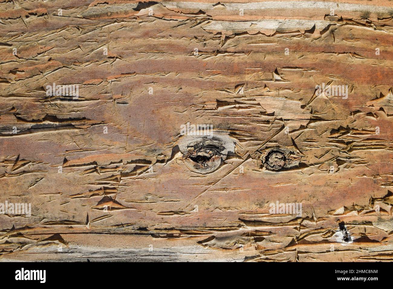 Brown wooden flaking cracks background. Damaged wood table peeling ...