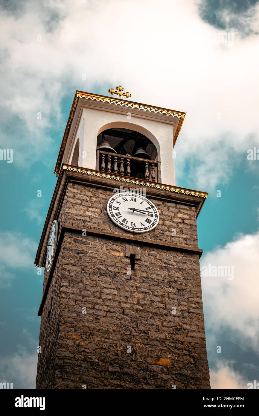Big church tower with a big clock Stock Photo - Alamy