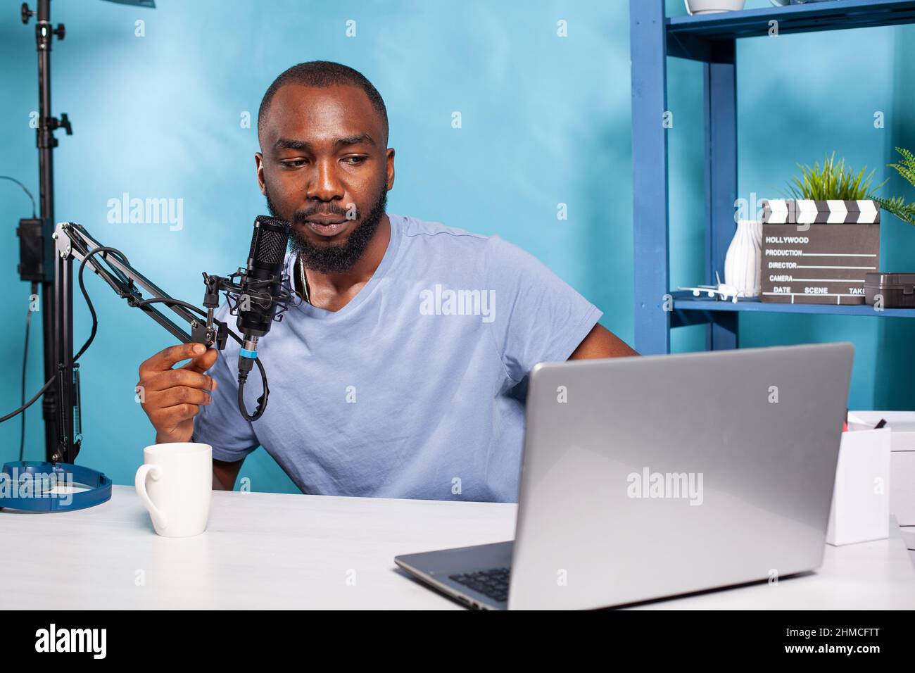 Influencer reading questions from followers received in live session on ...