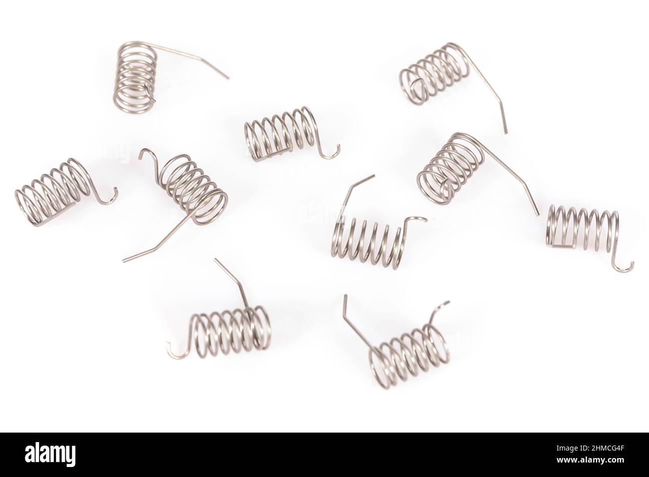 set of metal springs on a white isolated background Stock Photo - Alamy