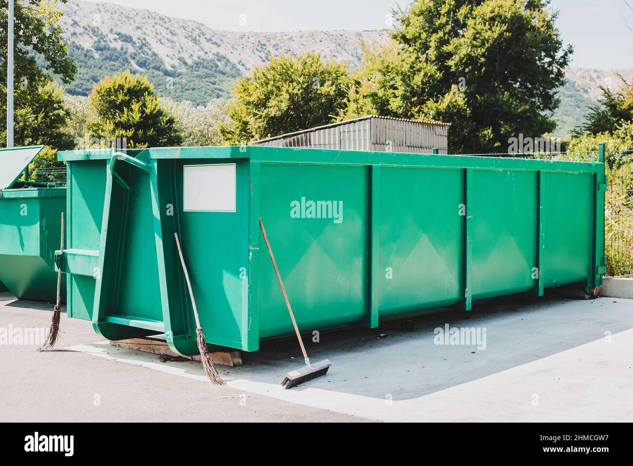 Large green garbage container at local waste sorting station Stock ...