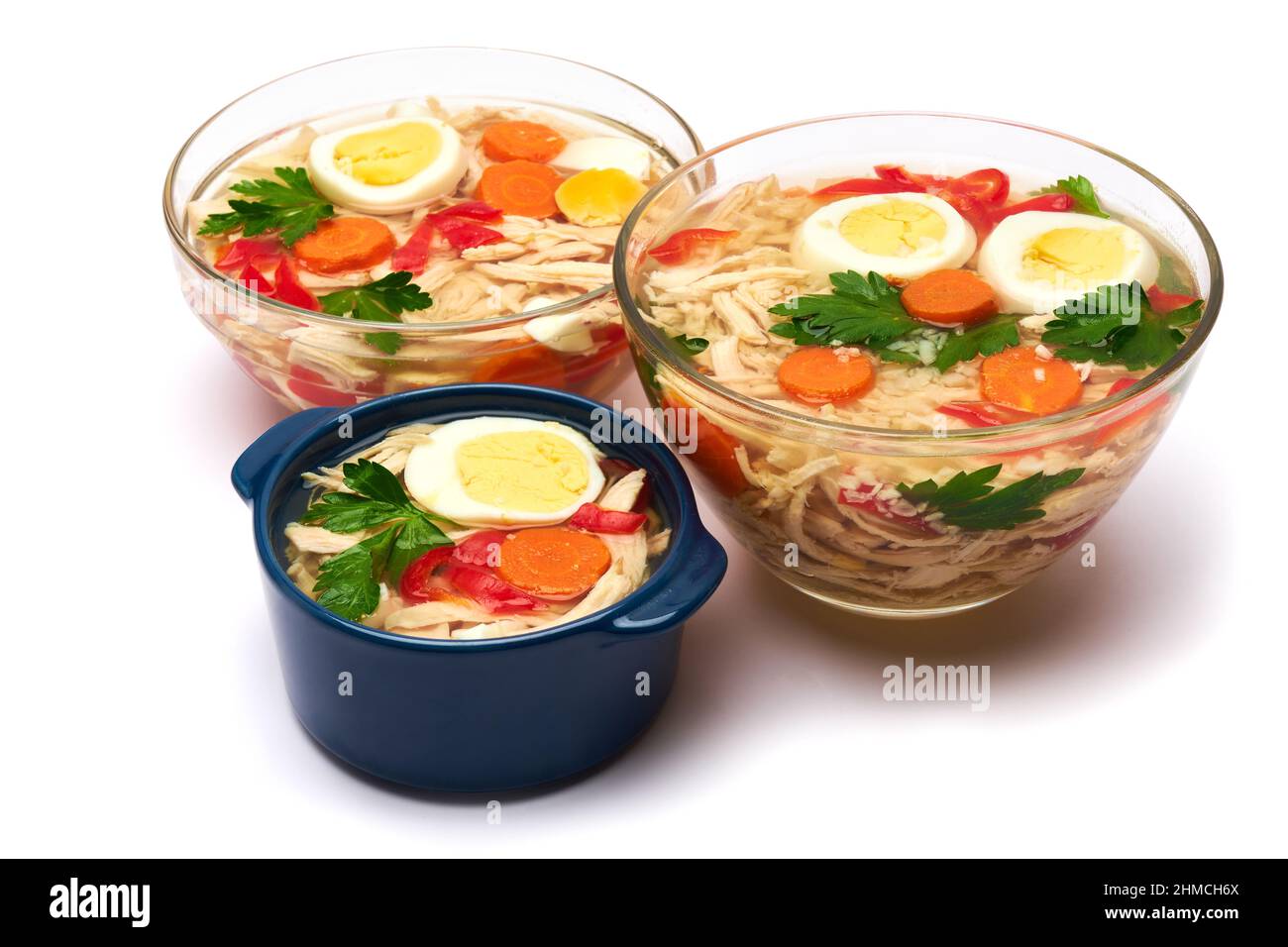 Delicious chicken aspic in glass bowl isolated on white background ...