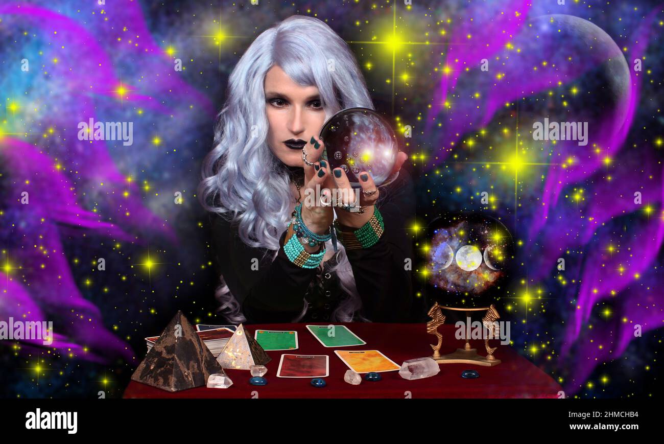 Female Psychic with crystal ball and tarot cards, Shallow DOF Stock ...