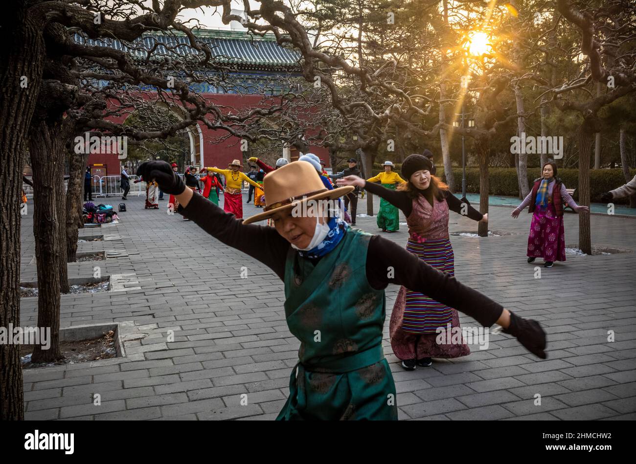 Beijing, China. 09th Feb, 2022. Women practice a group dance dressed in ...