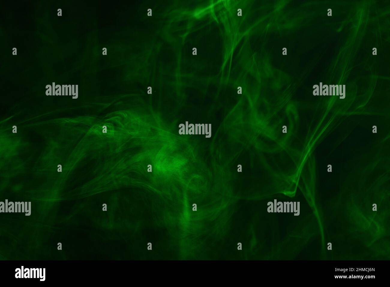Green steam on a black background. Copy space Stock Photo - Alamy