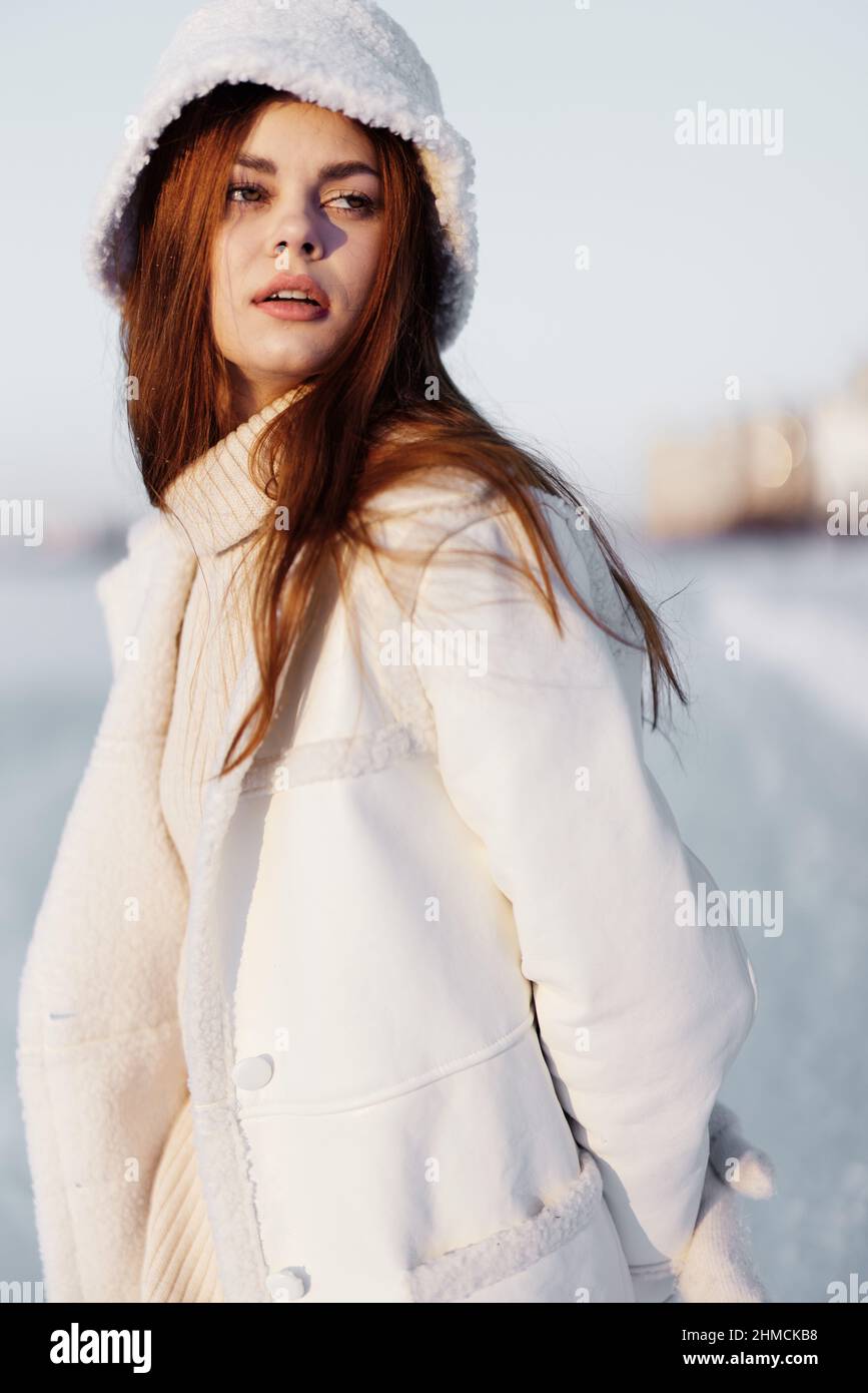 pretty woman red hair snow field winter clothes nature Stock Photo - Alamy