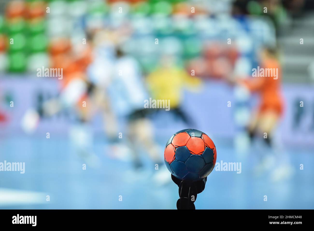 Detail of handball ball and match in the background Stock Photo - Alamy