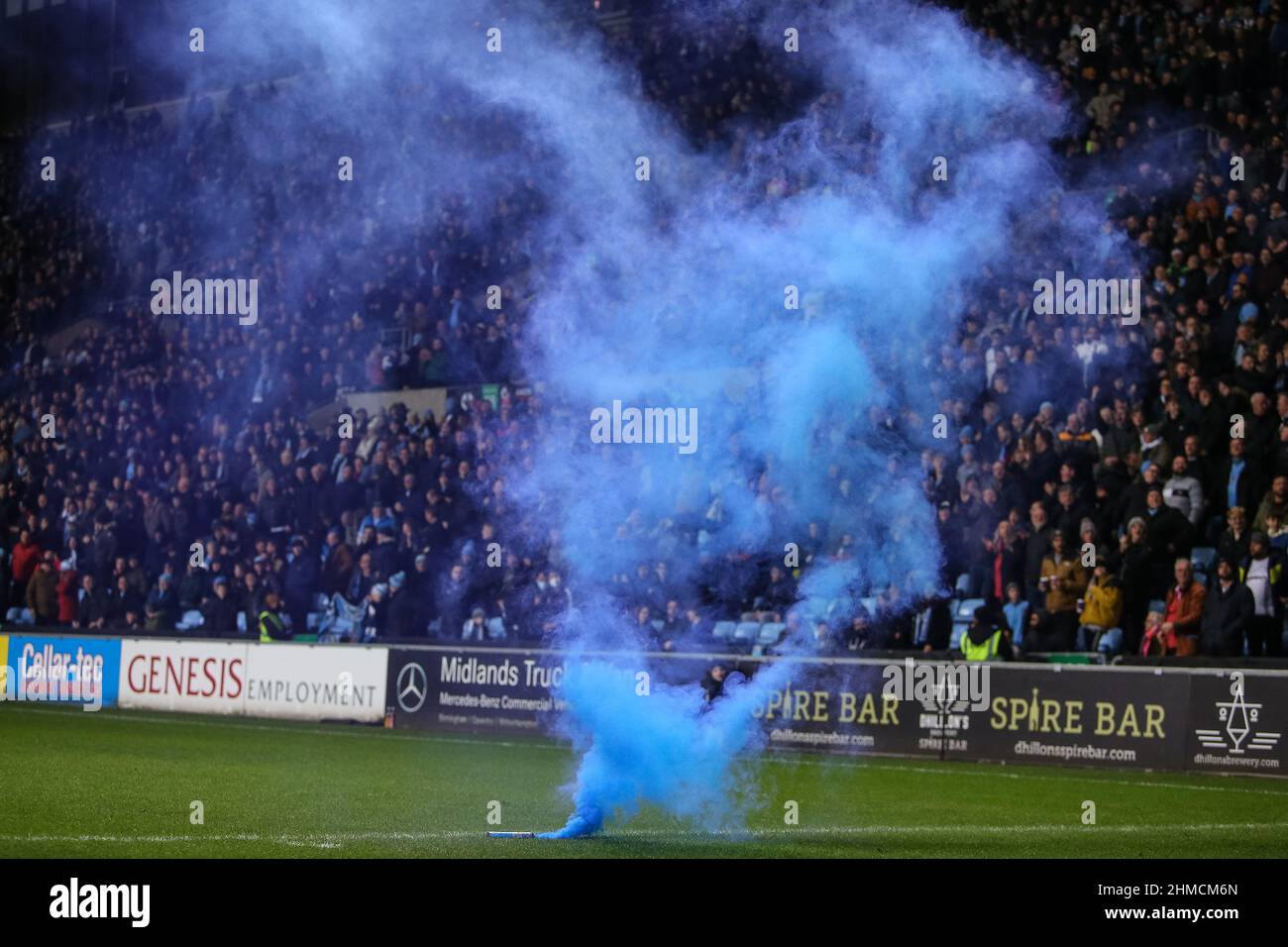 Coventry fans throw a flare onto the pitch after their team scored ...