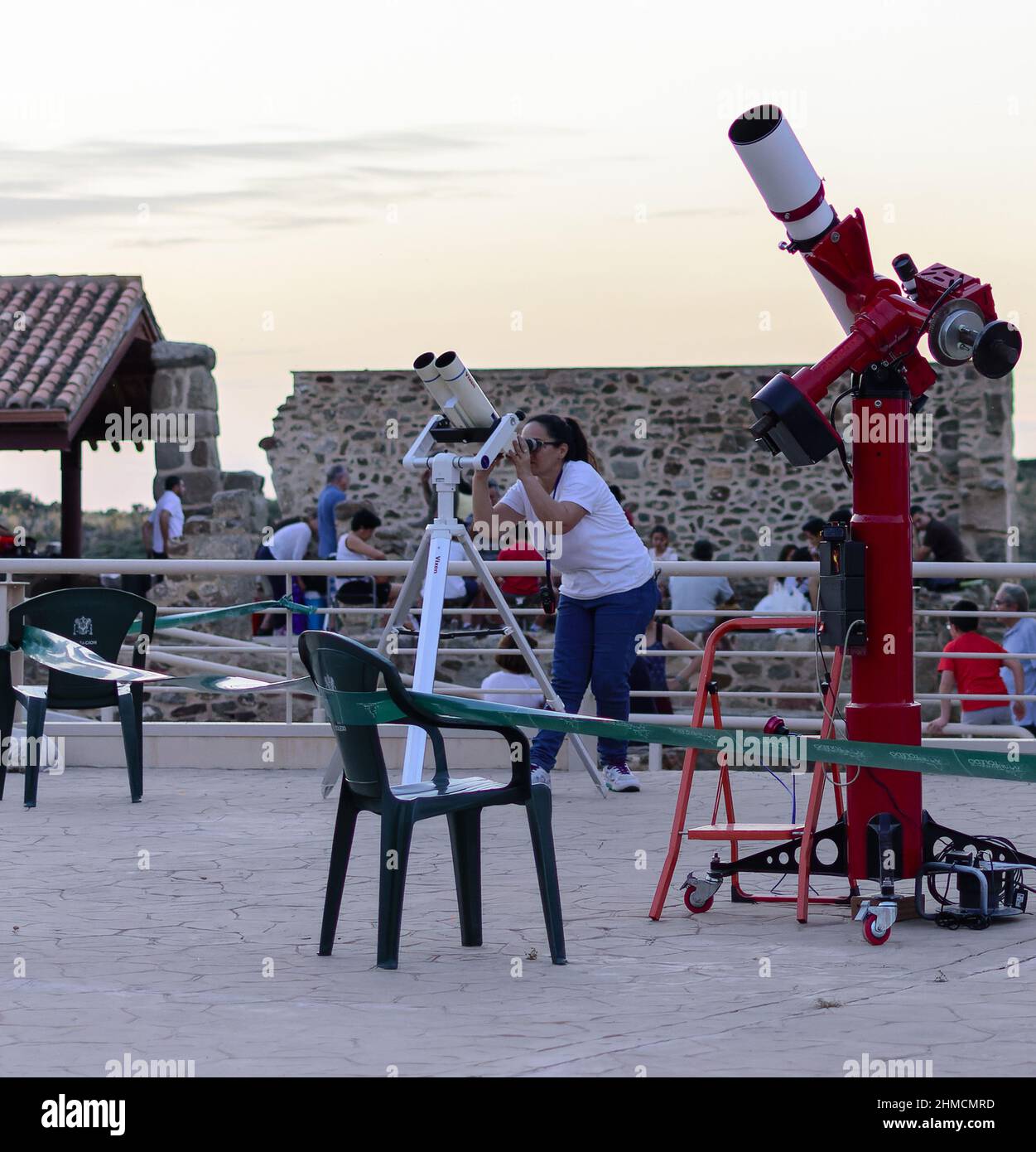 Astronomy enthusiast observing the sky with a telescope Stock Photo - Alamy
