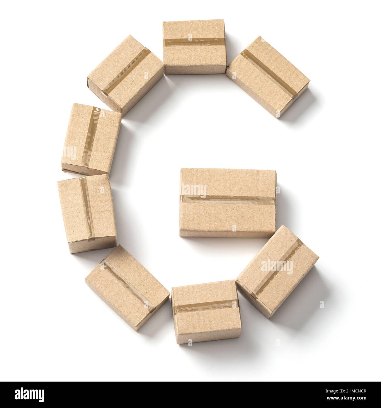 Letter G. Alphabet from cardboard boxes for delivery isolated on white ...
