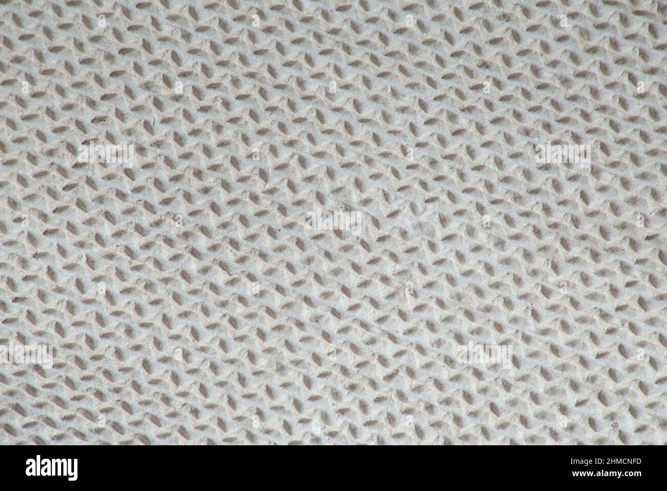 A diagonal lines and dots pattern on cardboard paper. background for ...