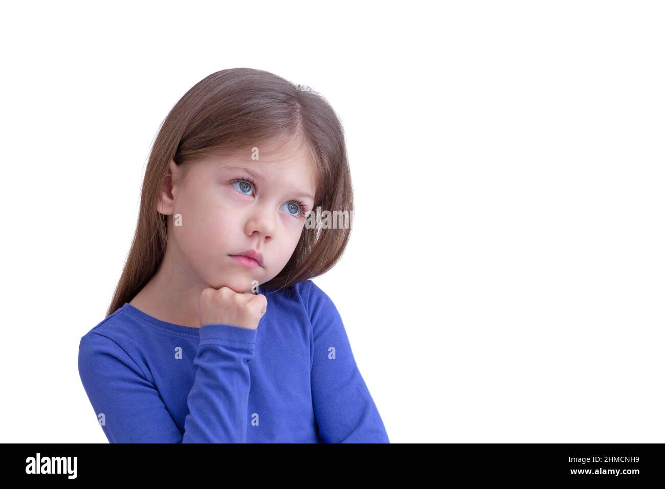 Thinking boring dreaming child kid isolated holding hand on chin on ...