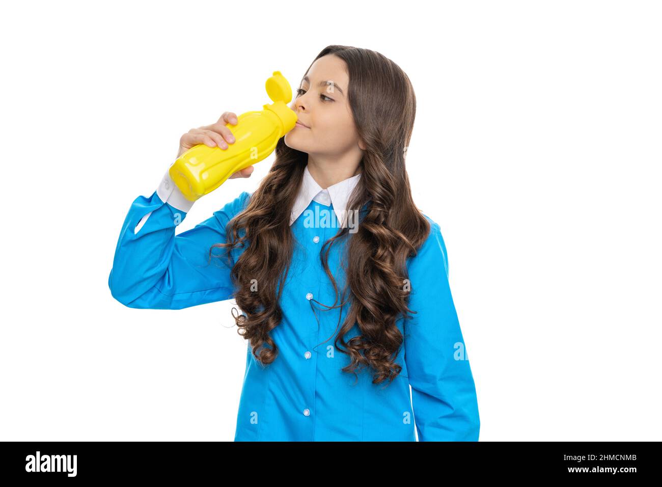 Taste and health put together. Little child drink from bottle. Yogurt ...