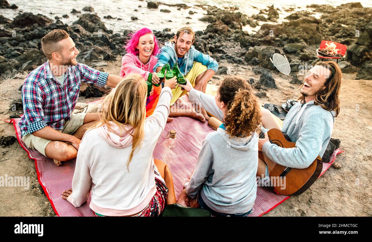 Vacationer group having fun together at beach camping party - Happy ...