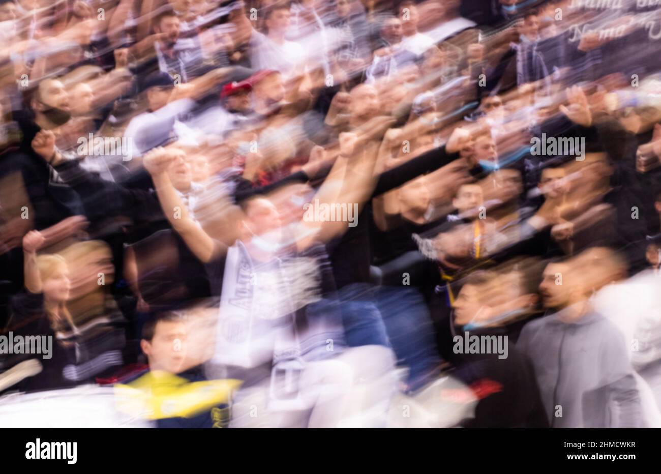 crowd of supporters at a sports event blurred image Stock Photo - Alamy