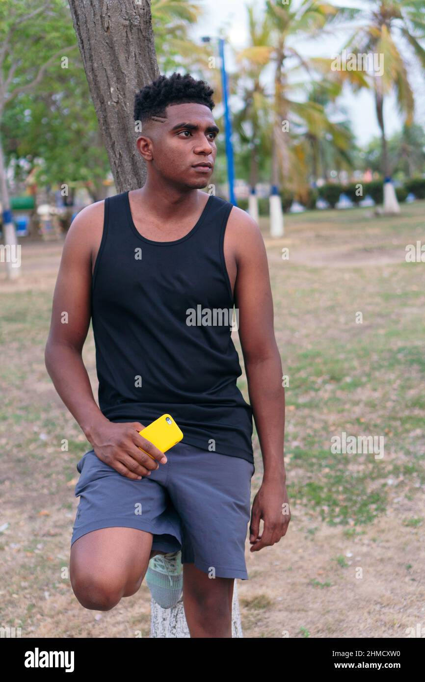 African man in outdoor exercise clothes Stock Photo - Alamy