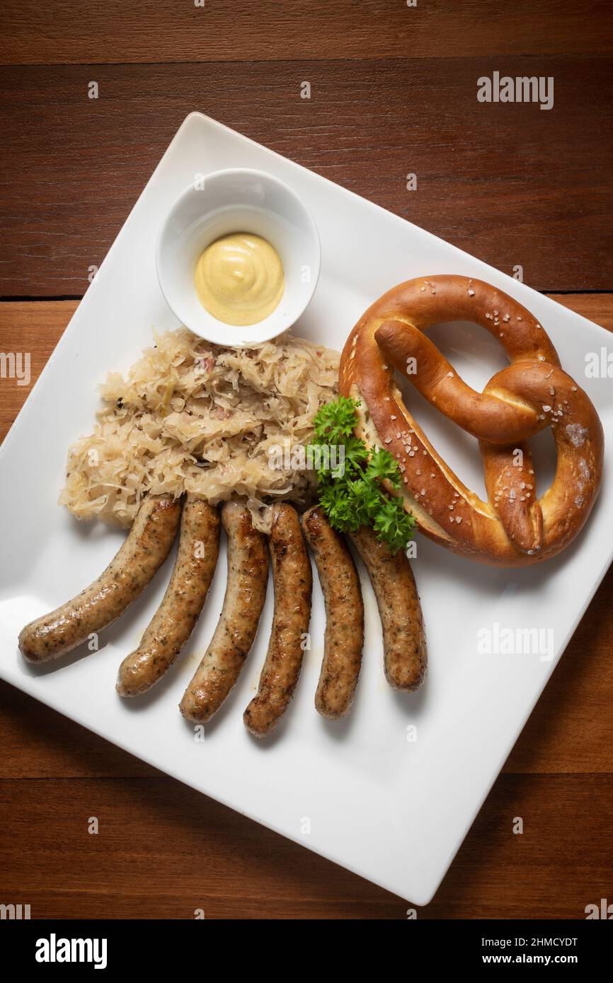 traditional german bavarian meal of sausages with sauerkraut and ...