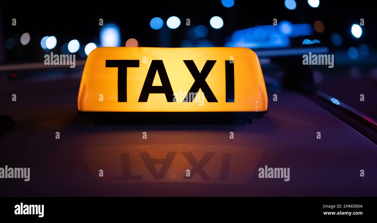 Close up illuminated taxi sign hi-res stock photography and images - Alamy