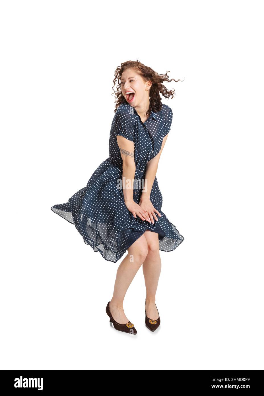Portrait of young beautiful excited girl in retro style dress, fashion ...