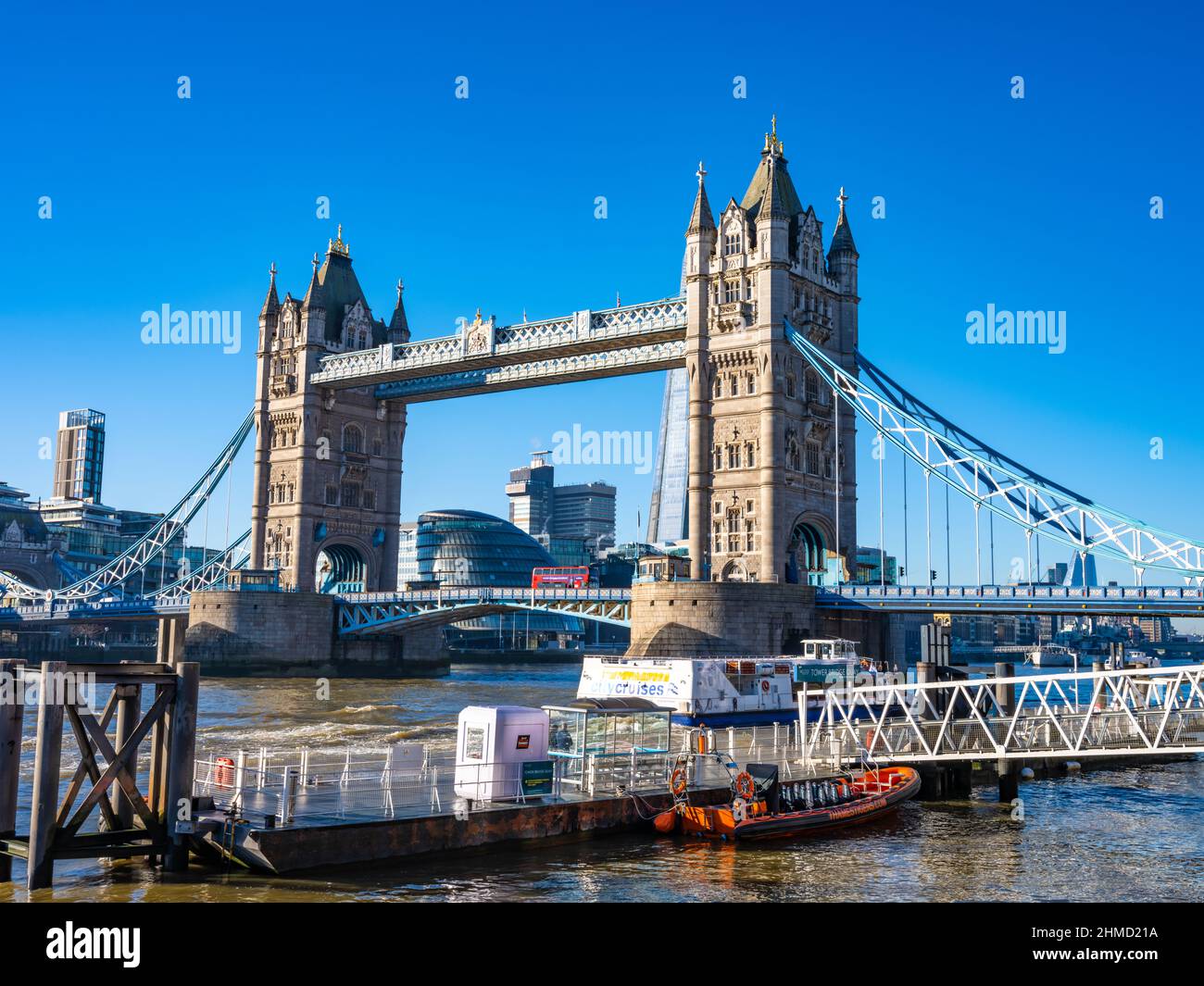 Tower Bridge, London buses, Tower Bridge Quay Stock Photo - Alamy