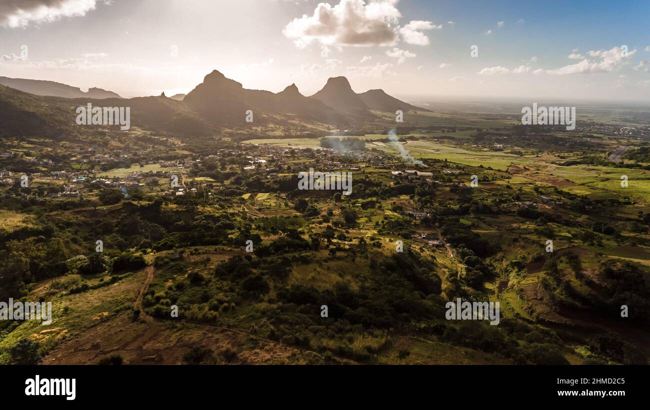 Mauritius Sunset with Mountains and villages Stock Photo - Alamy
