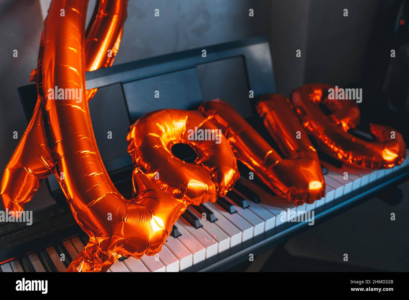 balloon in shape of word love on piano keys. copy space. Greeting card ...