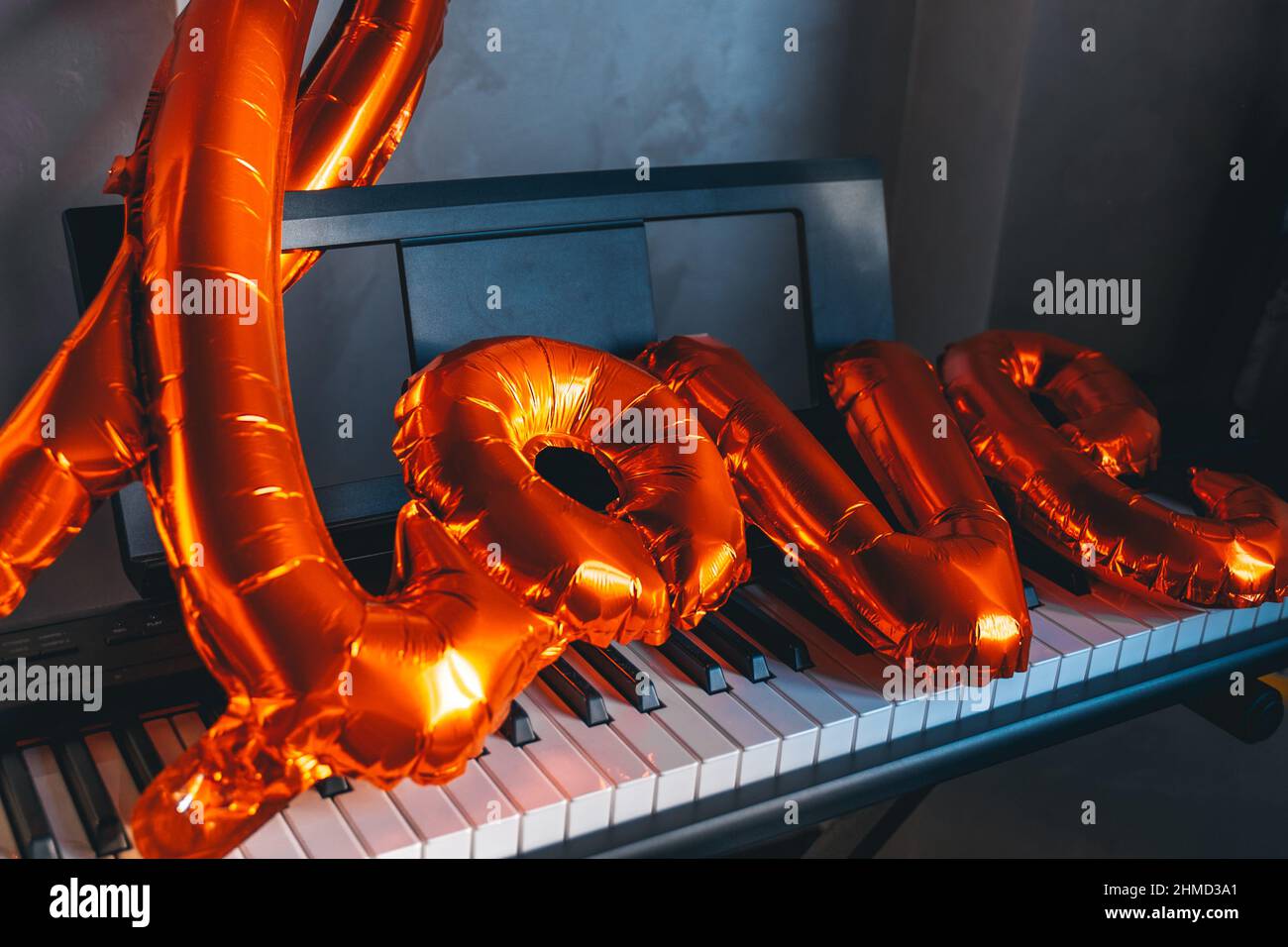 balloon in shape of word love on piano keys. copy space. Greeting card ...