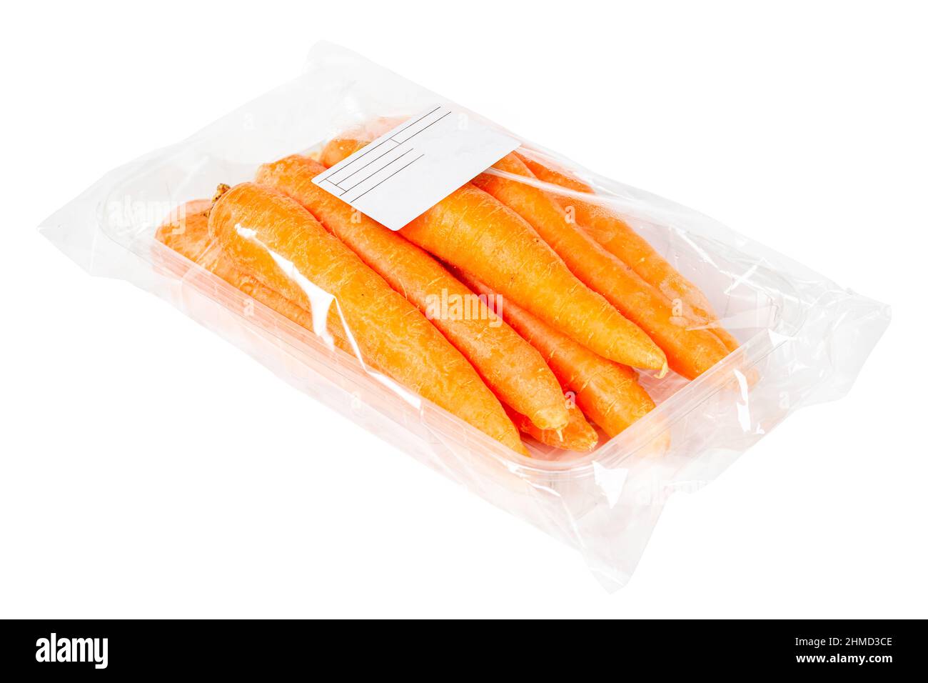 New harvest cleaned carrots packed and labeled on isolated white ...
