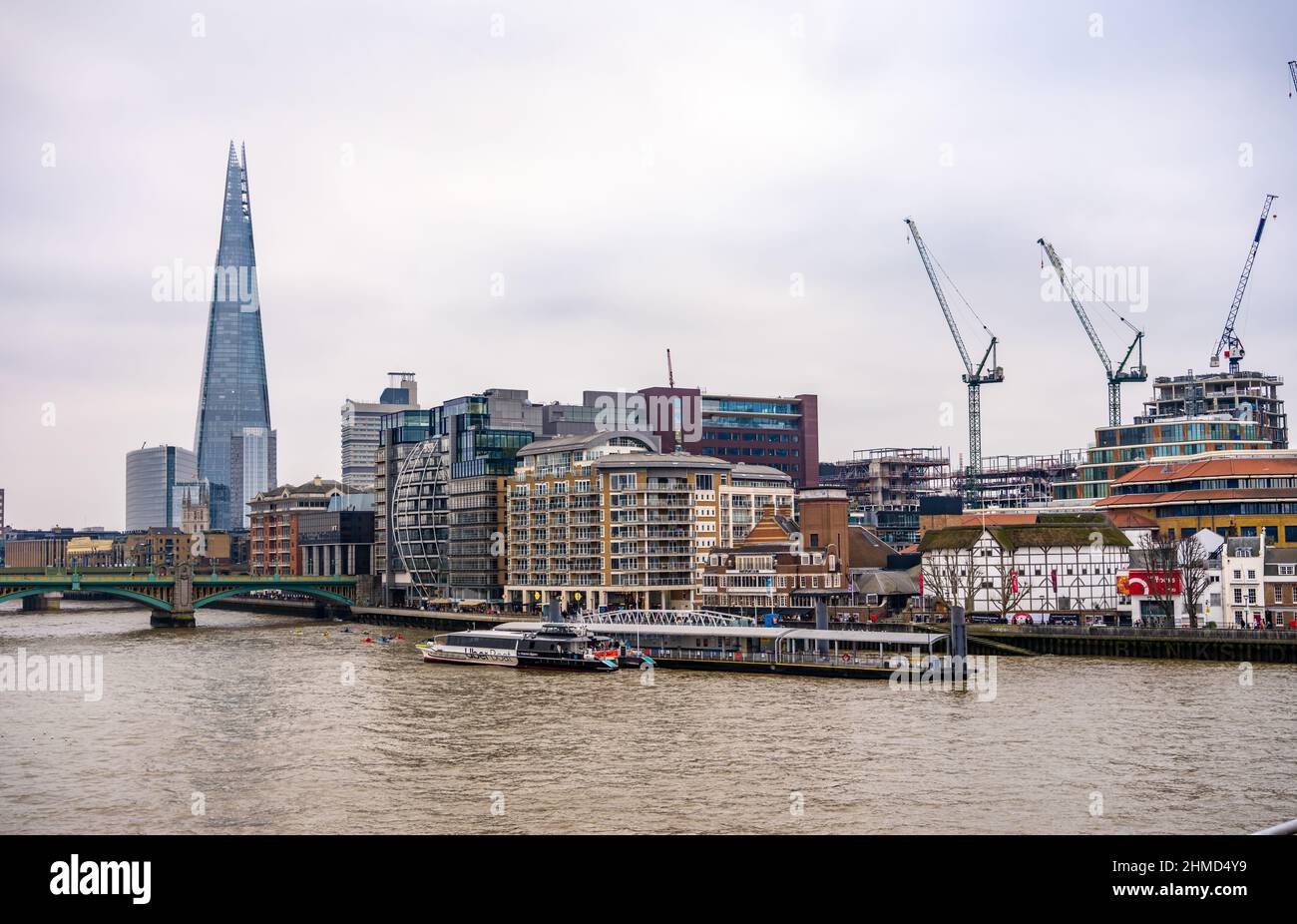 The Thames, pier, Uber boat, The Shard. Shakespeare Globe Theatre Stock ...