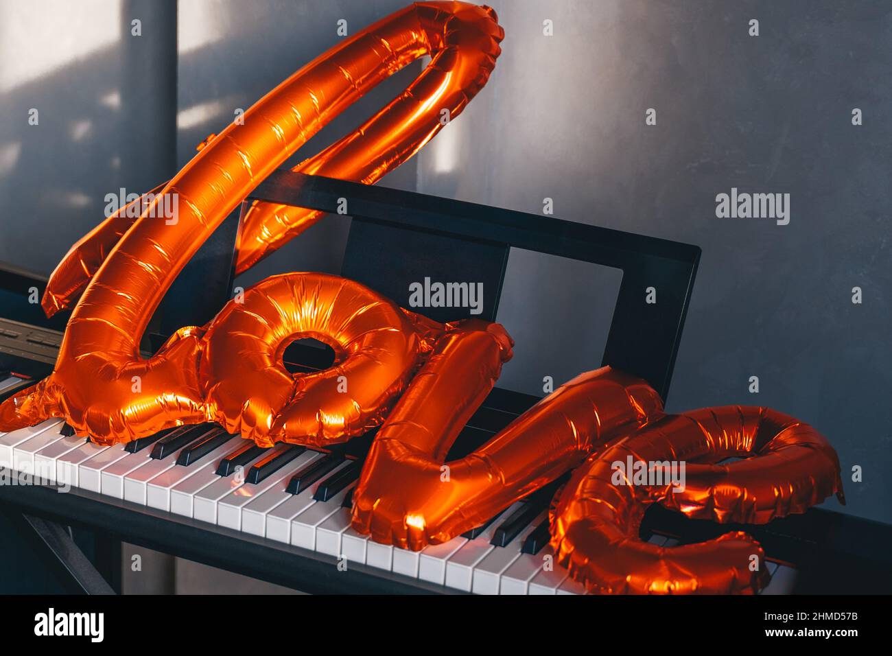 balloon in shape of word love on piano keys. copy space. Greeting card ...
