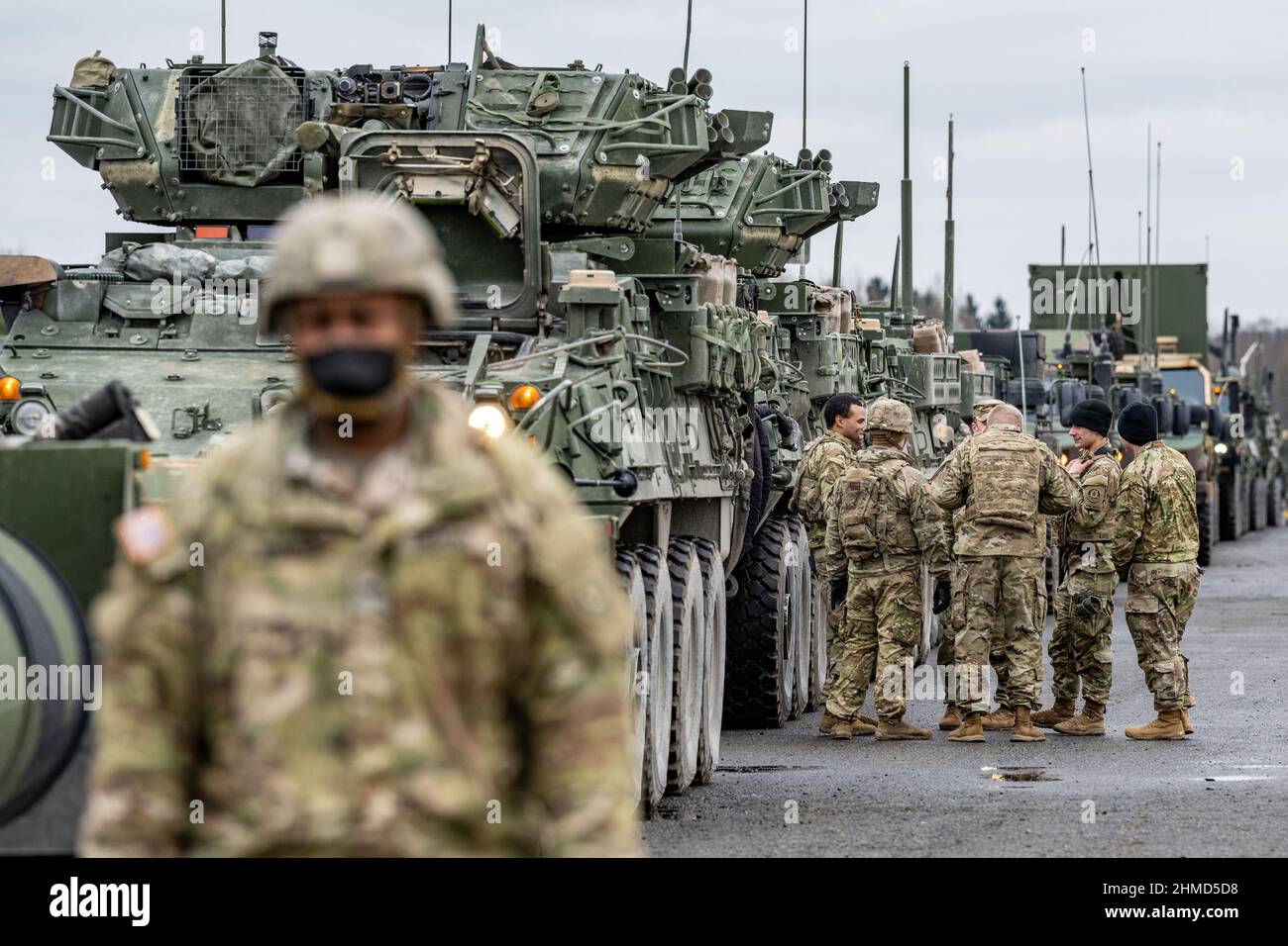 Vilseck, Germany. 09th Feb, 2022. U.S. soldiers stand next to U.S. Army ...