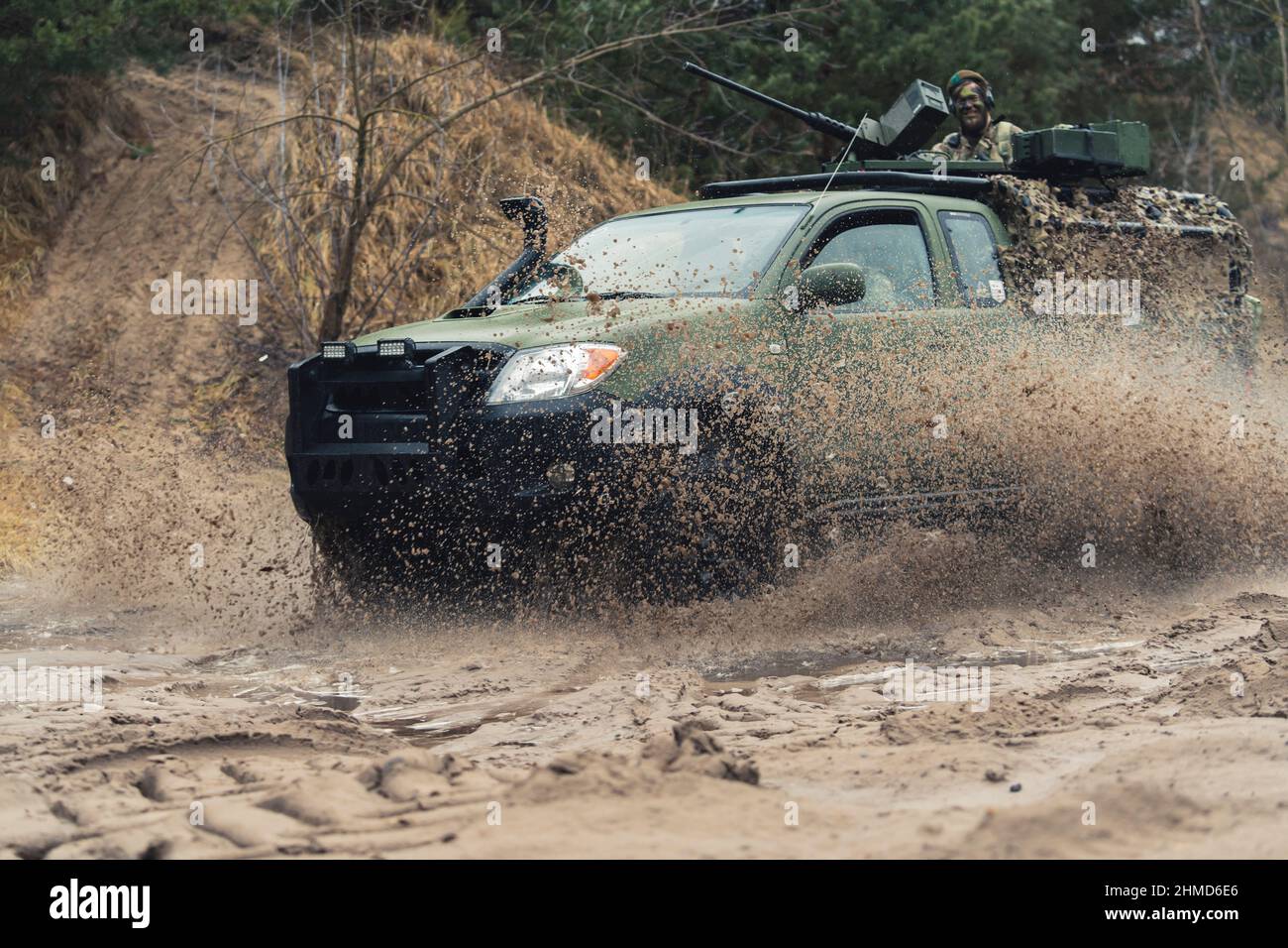 Protected Patrol Vehicle of British armed forces cruising in dirt ...