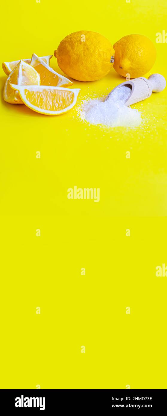 Citric acid on a yellow background. Selective focus.nature Stock Photo ...