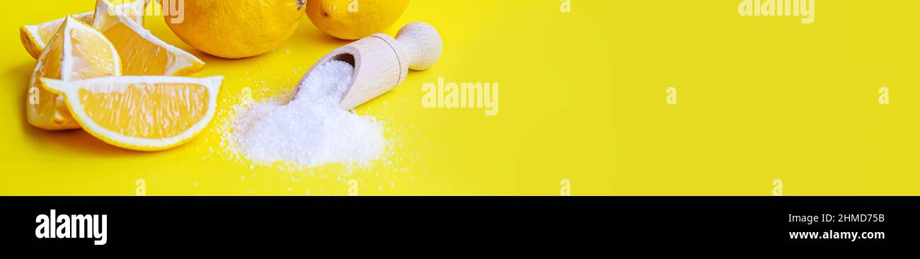 Citric acid on a yellow background. Selective focus.nature Stock Photo ...