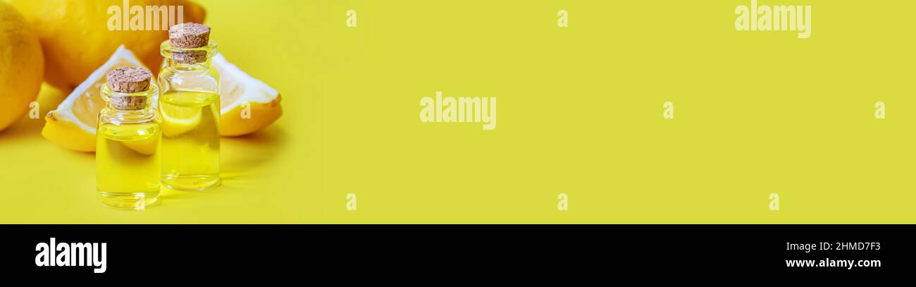 lemon essential oil on a yellow background. Selective focus.nature ...