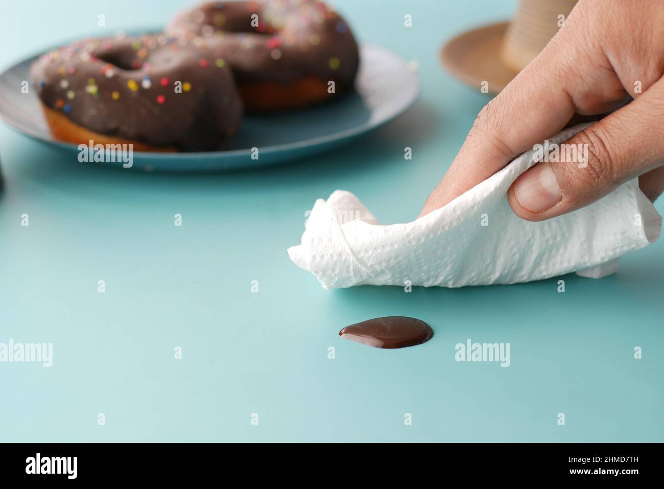 close up of person hand cleaning table with cloth Stock Photo - Alamy