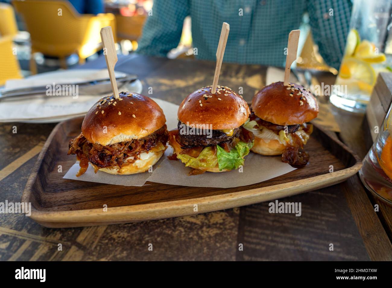 3 different kind of burger tasting in a restaurant Stock Photo - Alamy